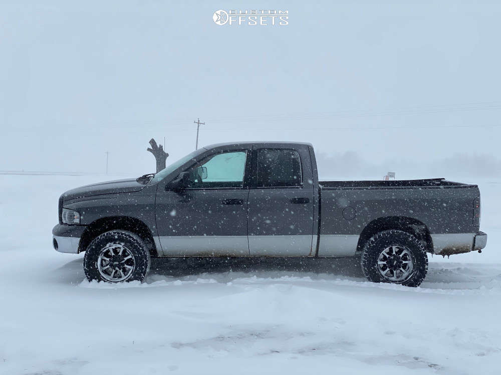2003 Dodge Ram 1500 with 18x10 -24 Moto Metal Mo970 and 325/60R18 Nitto ...