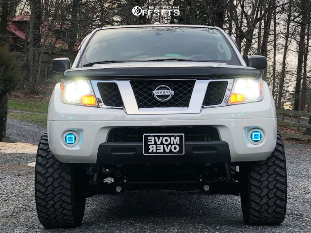 2014 Nissan Frontier with 20x10 -24 Anthem Off-Road Gunner and 295 ...