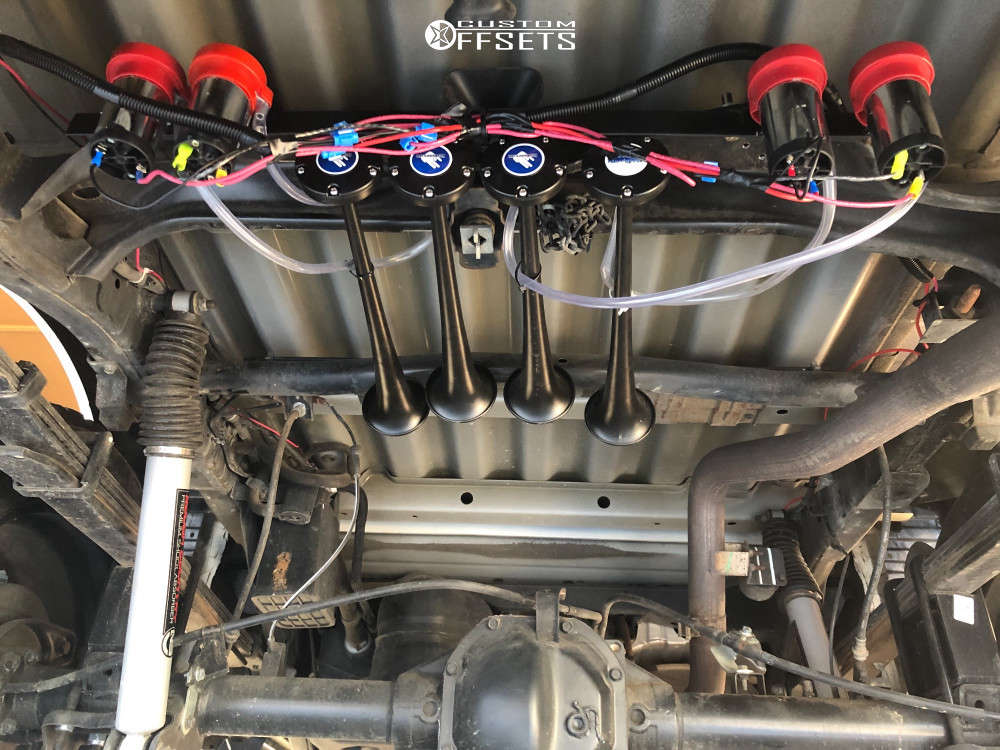 2014 Nissan Frontier with 20x10 -24 Anthem Off-Road Gunner and 295 ...