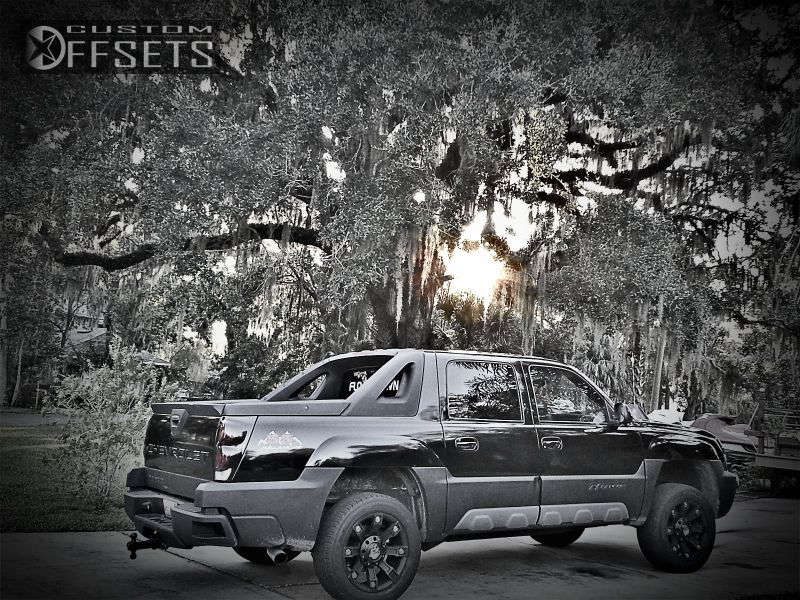 2002 Chevrolet Avalanche with 20x9 4 Pro Comp 7113 and 275/55R20 Falken ...