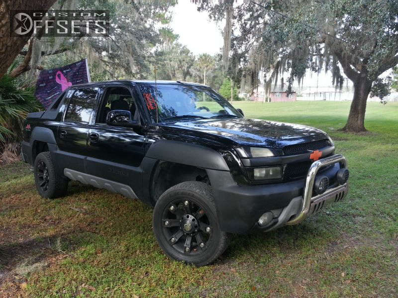 2002 Chevrolet Avalanche with 20x9 4 Pro Comp 7113 and 275/55R20 Falken ...