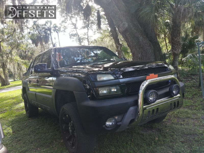 2002 Chevrolet Avalanche with 20x9 4 Pro Comp 7113 and 275/55R20 Falken ...