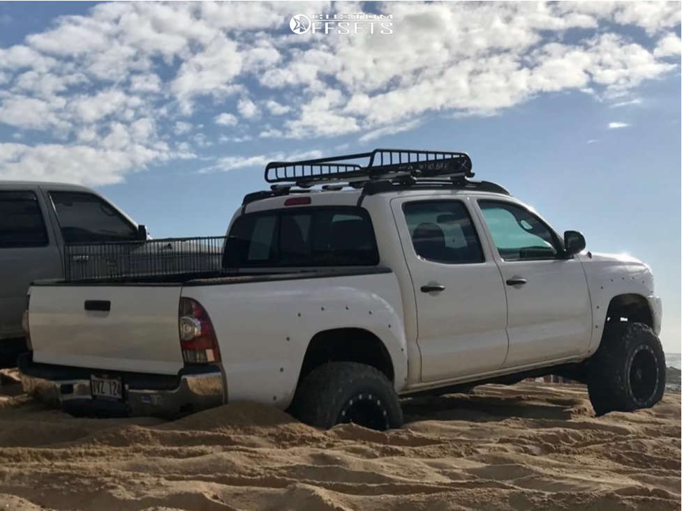 2010 Toyota Tacoma with 17x9 -6 Pro Comp Series 31 and 265/70R17 ...