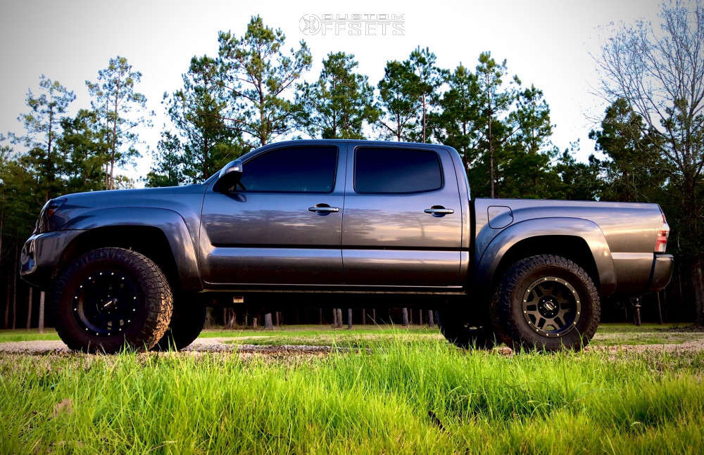 2013 Toyota Tacoma with 17x9 -6 Pro Comp Series 41 and 285/70R17 Nitto ...