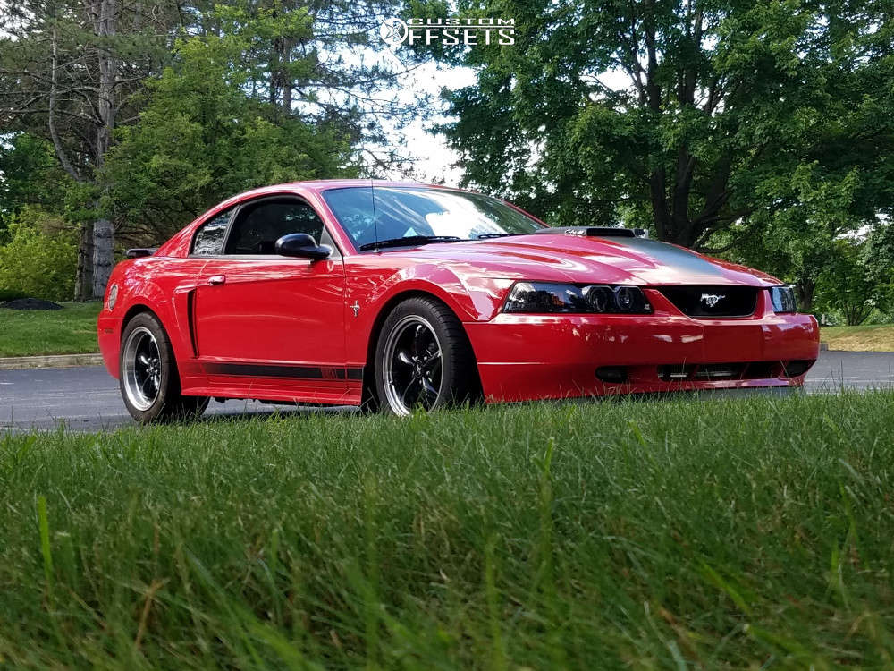 2003 Ford Mustang with 17x9 American Racing Torq Thrust Ii and 275 ...