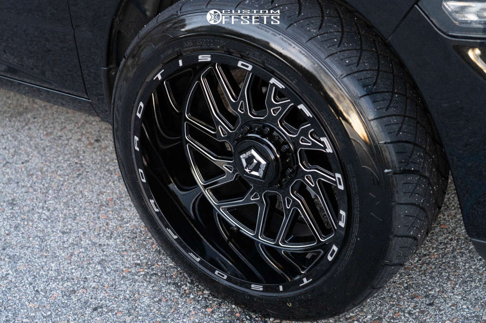 2018 Ram 1500 with 22x12 -44 TIS 544BM and 305/45R22 Nitto NT420V and ...