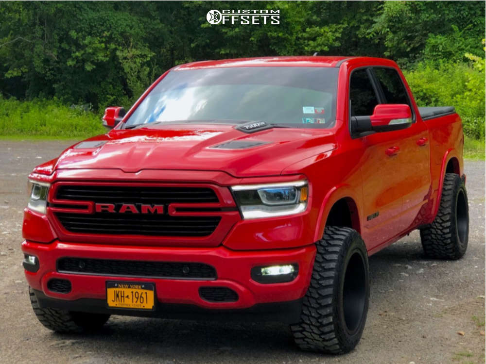 2019 Ram 1500 with 20x12 -51 Vision Bomb and 33/12.5R20 Kanati Mud Hog ...