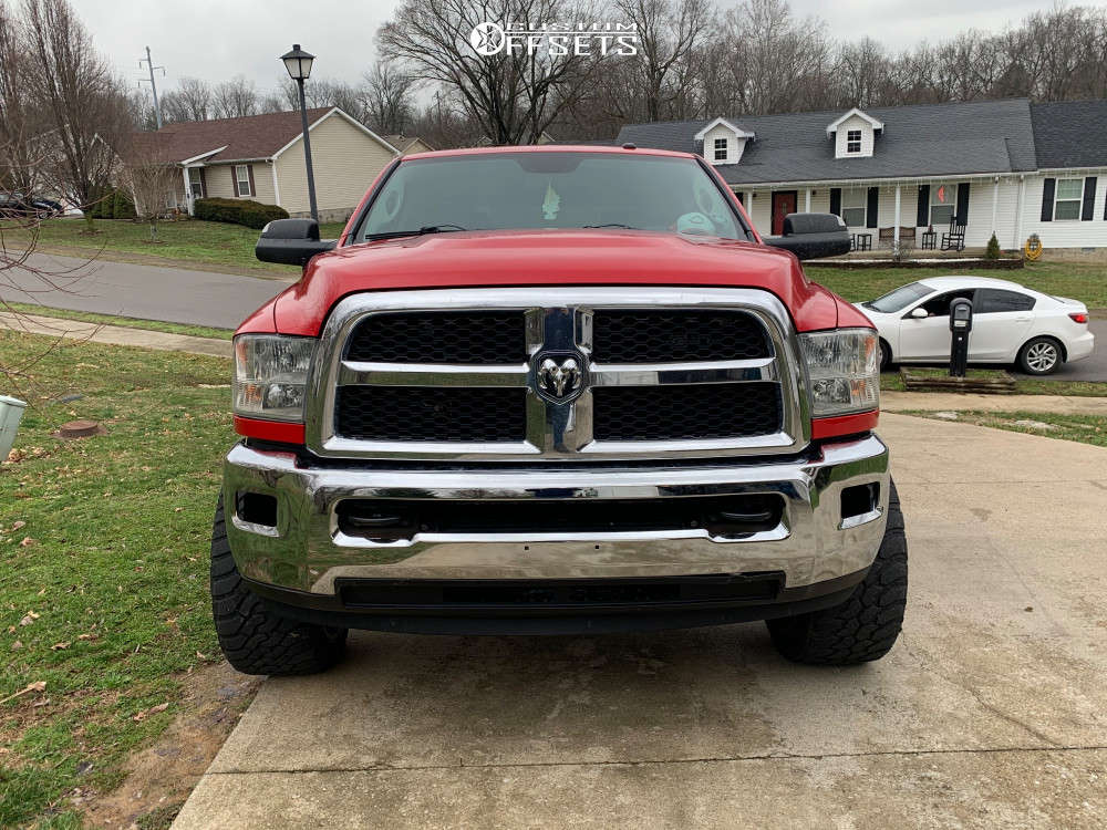 2014 Ram 2500 with 24x12 -44 TIS 544C and 35/12.5R24 Haida Mud Champ ...