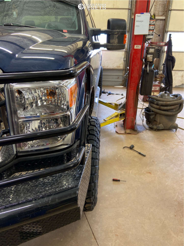 2015 Ford F-250 Super Duty with 18x9 -12 Raceline Defender and 285 ...