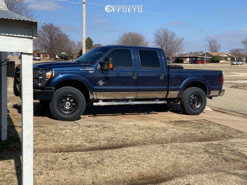 2015 Ford F-250 Super Duty with 18x9 -12 Raceline Defender and 285 ...
