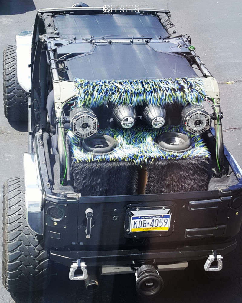 2008 Jeep Wrangler with 22x14 -70 Fuel Cleaver D240 and 40/15.5R22 Toyo ...