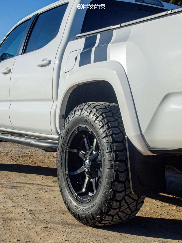 2017 Toyota Tacoma with 18x9 -12 Fuel Coupler and 275/65R18 Nitto Ridge ...