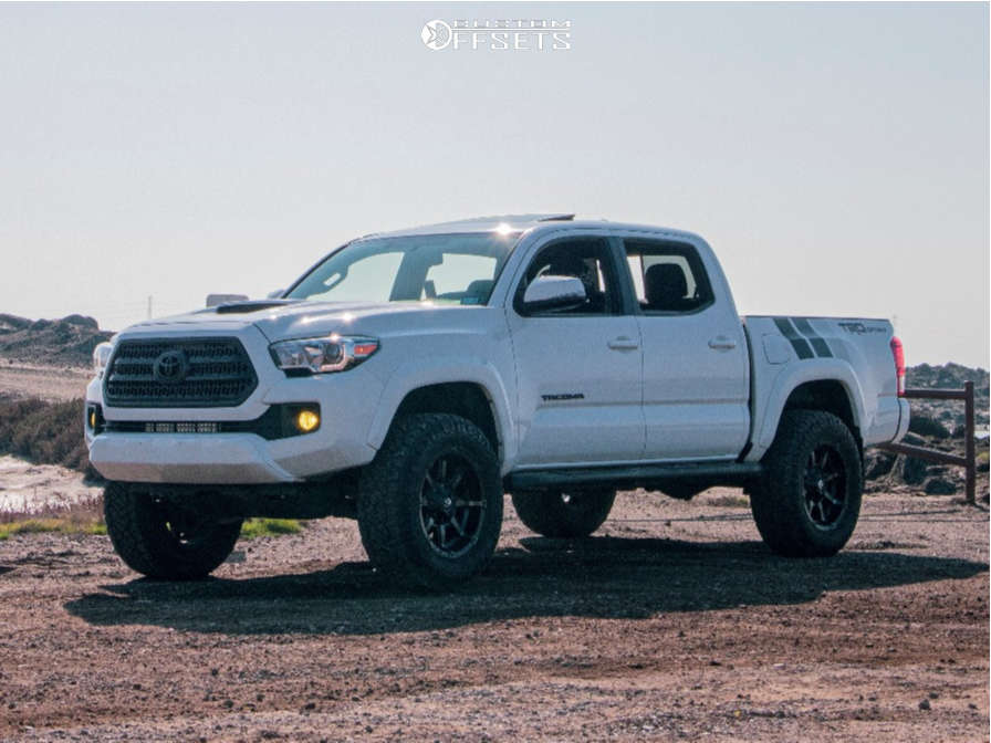 2017 Toyota Tacoma with 18x9 -12 Fuel Coupler and 275/65R18 Nitto Ridge ...
