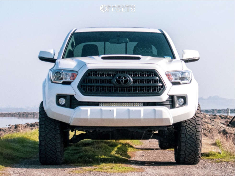 2017 Toyota Tacoma with 18x9 -12 Fuel Coupler and 275/65R18 Nitto Ridge ...