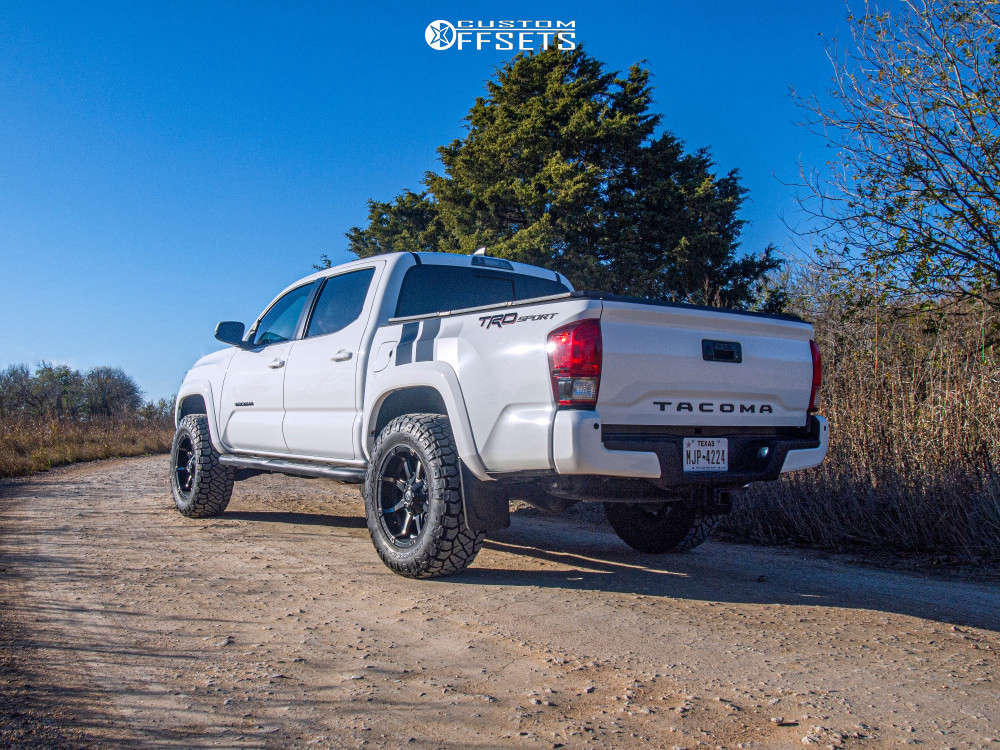 2017 Toyota Tacoma with 18x9 -12 Fuel Coupler and 275/65R18 Nitto Ridge ...