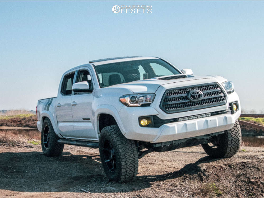 2017 Toyota Tacoma with 18x9 -12 Fuel Coupler and 275/65R18 Nitto Ridge ...