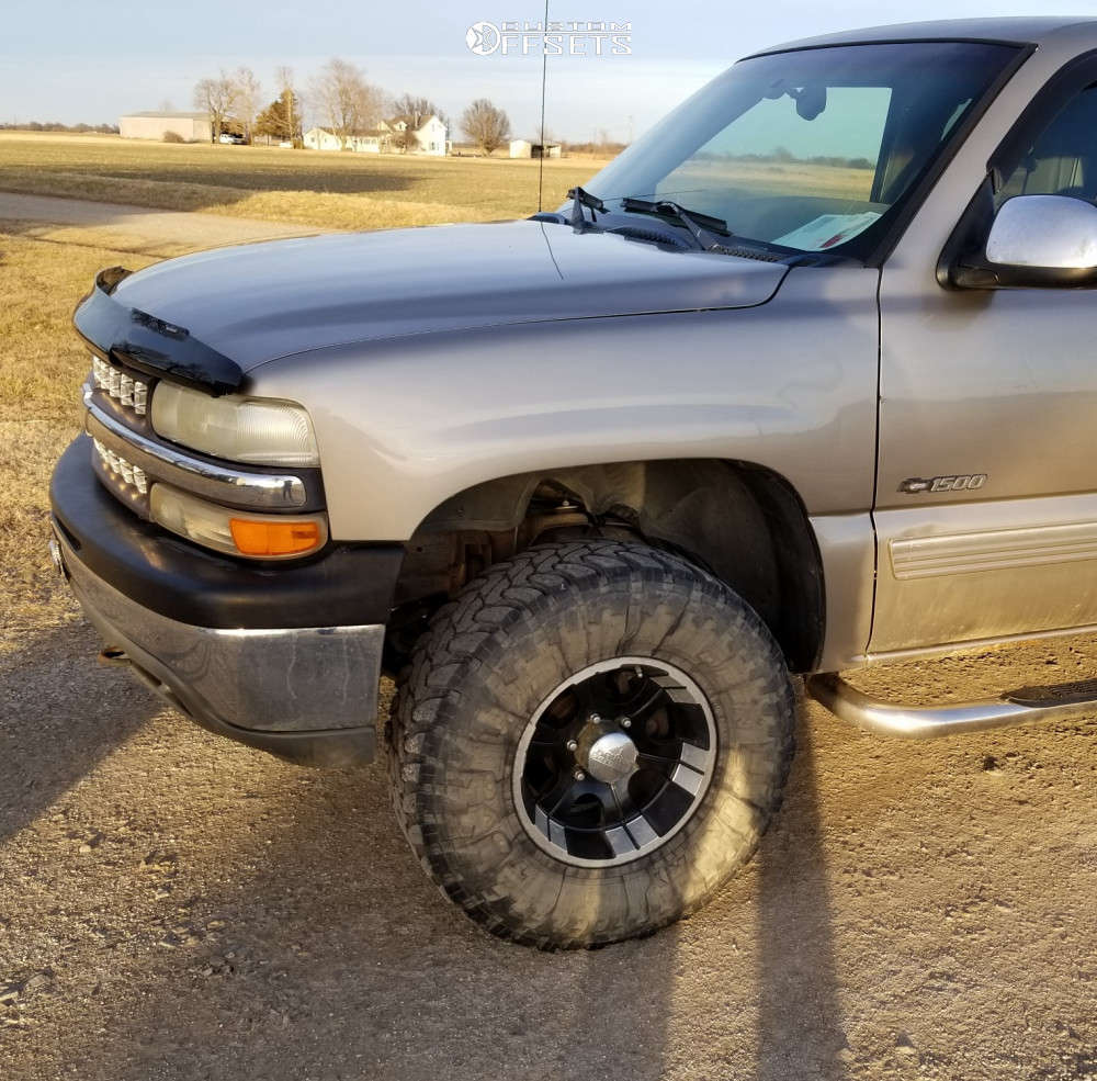 1999 Chevrolet Silverado 1500 with 16x9 -12 Devino DV349 and 305/70R16 ...
