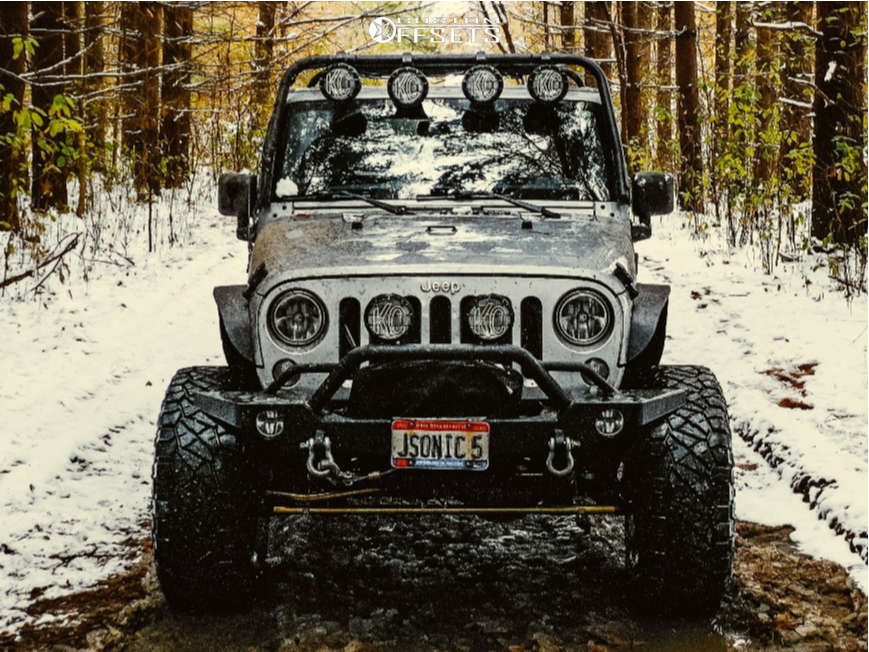 2014 Jeep Wrangler JK with 17x9 -6 Pro Comp Series 69 and 35/12.5R17 ...