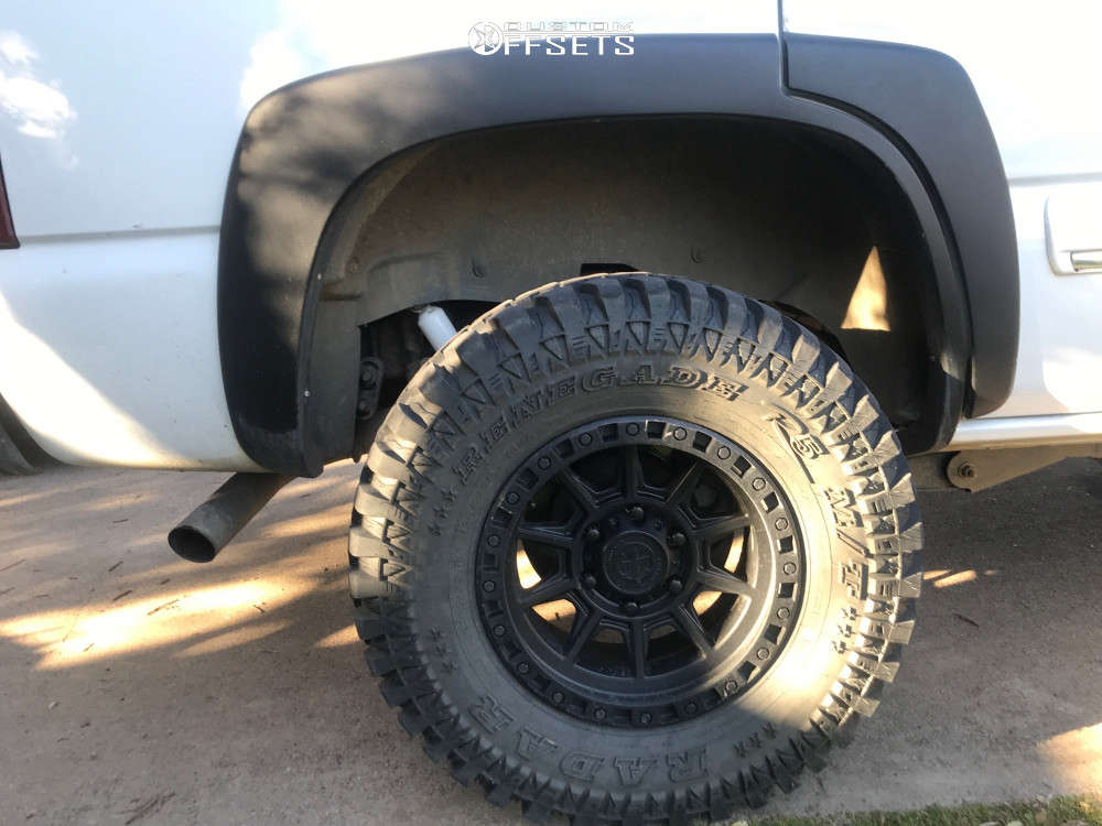 2003 Chevrolet Tahoe with 16x8 American Racing Ar202 and 265/75R16 ...