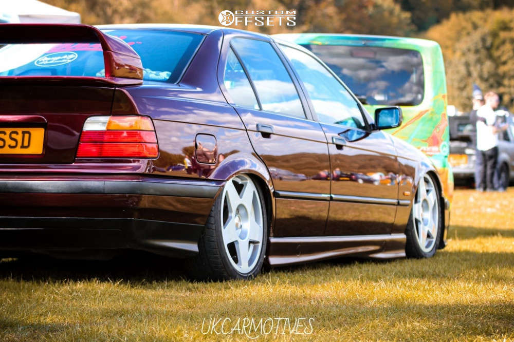 1998 BMW 318i with 17x7.5 41 Bola B10 and 225/45R17 Deestone Expedite ...