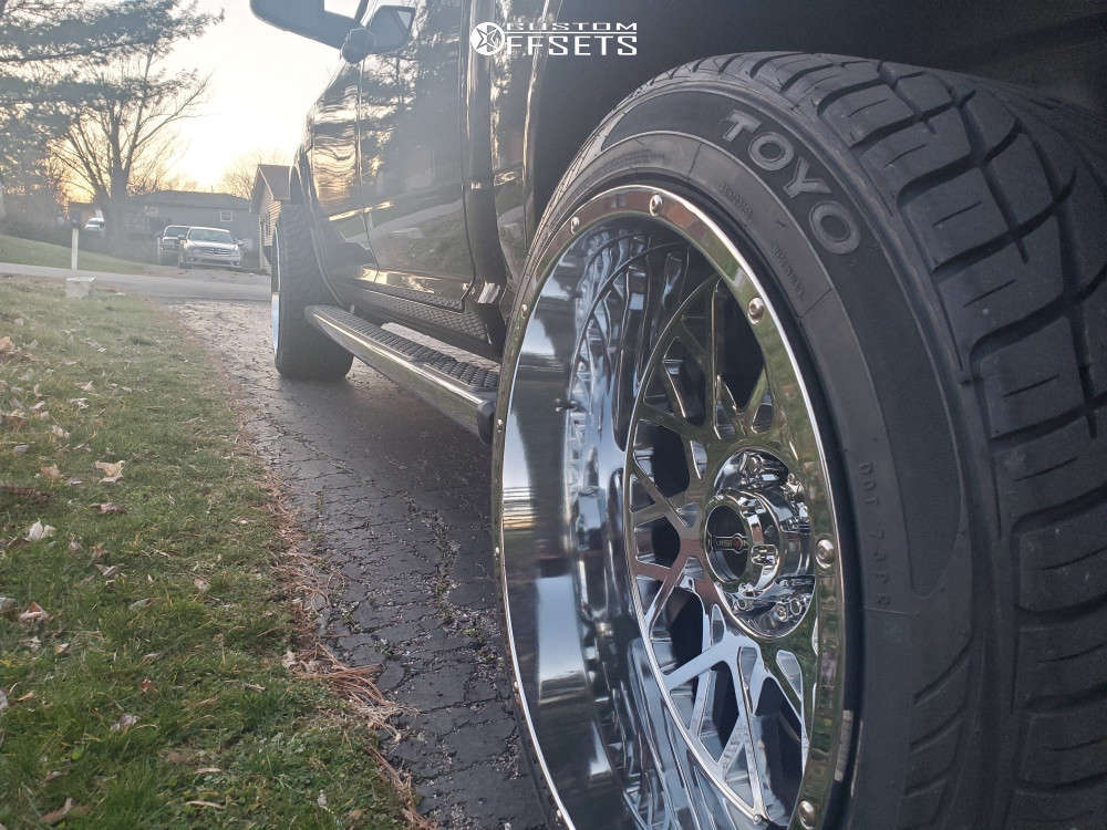 2016 Dodge Ram 1500 with 22x12 -51 Vision Rocker and 305/12.5R22 Toyo ...