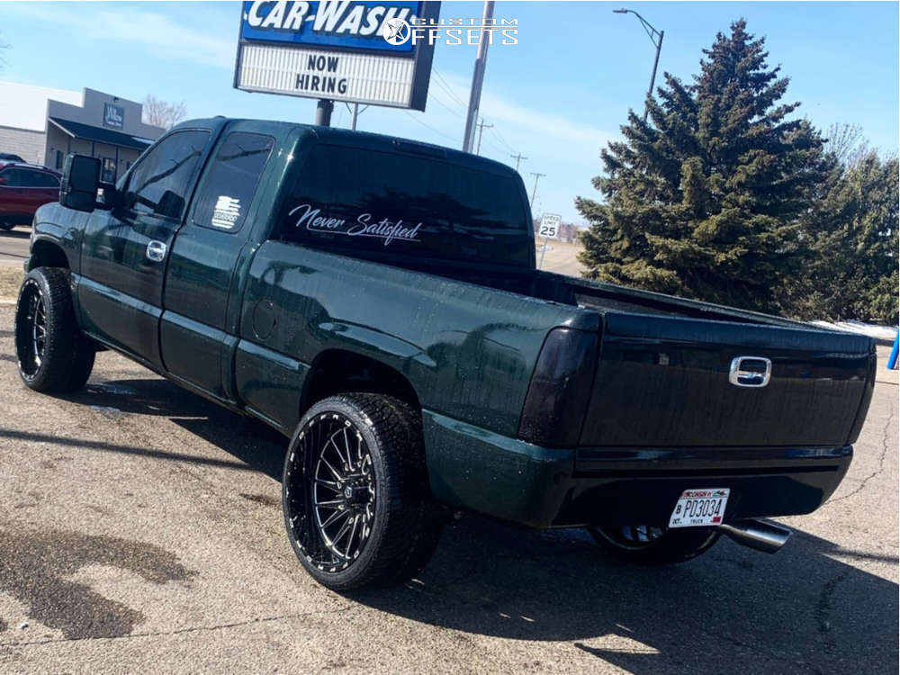 2002 Chevrolet Silverado 1500 with 24x12 -44 TIS 547BM and 305/35R24 ...