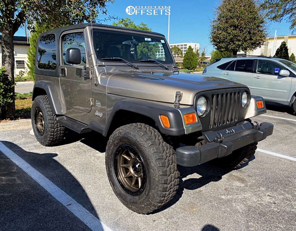 2003 Jeep TJ with 17x9 -12 American Racing Ar202 and 285/70R17 Pro Comp ...