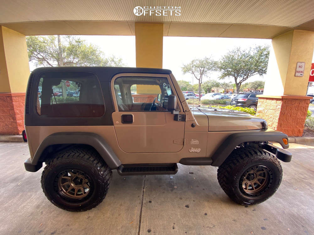 2003 Jeep TJ with 17x9 -12 American Racing Ar202 and 285/70R17 Pro Comp ...