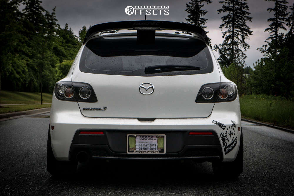 2009 Mazda MazdaSpeed3 with 18x8.5 38 Enkei Evo X GSR and 235/40R18 ...