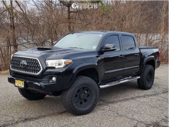 2019 Toyota Tacoma with 17x9 -6 Pro Comp 69 and 285/70R17 Falken ...