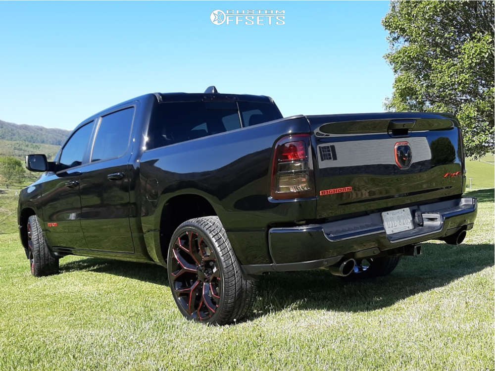 2020 Ram 1500 with 24x10 31 Strada Replicas GM Snowflake Replica and ...