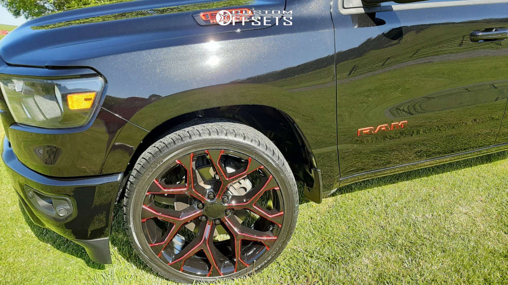 2020 Ram 1500 with 24x10 31 Strada Replicas GM Snowflake Replica and ...