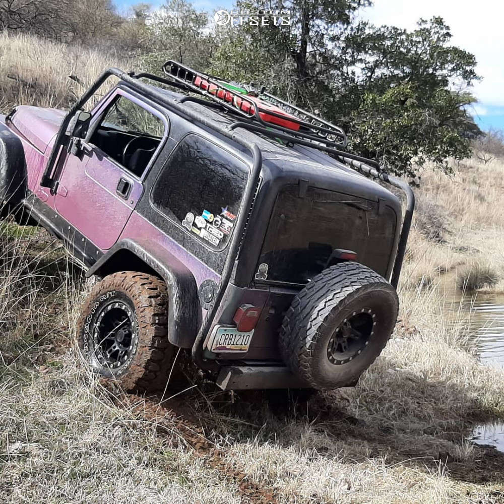 2002 Jeep Wrangler with 15x8 -19 Pro Comp Series 31 and 33/12.5R15 ...