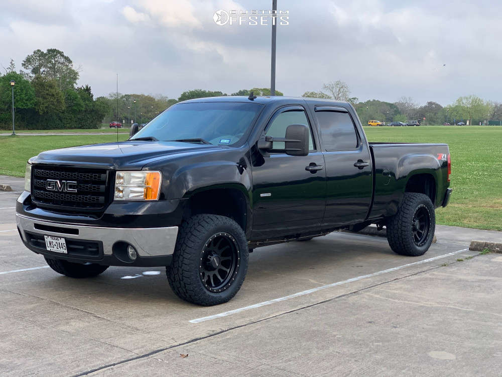2009 GMC Sierra 2500 HD with 20x10 -24 Method Mr605 and 33/12.5R20 Toyo ...