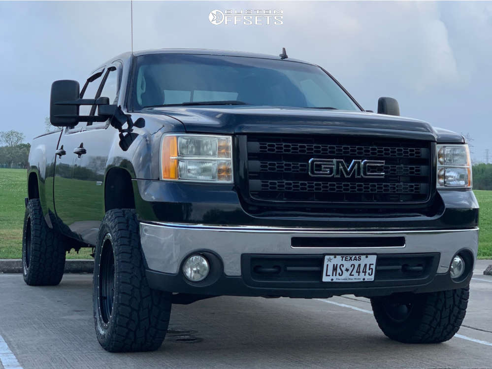 2009 GMC Sierra 2500 HD with 20x10 -24 Method Mr605 and 33/12.5R20 Toyo ...