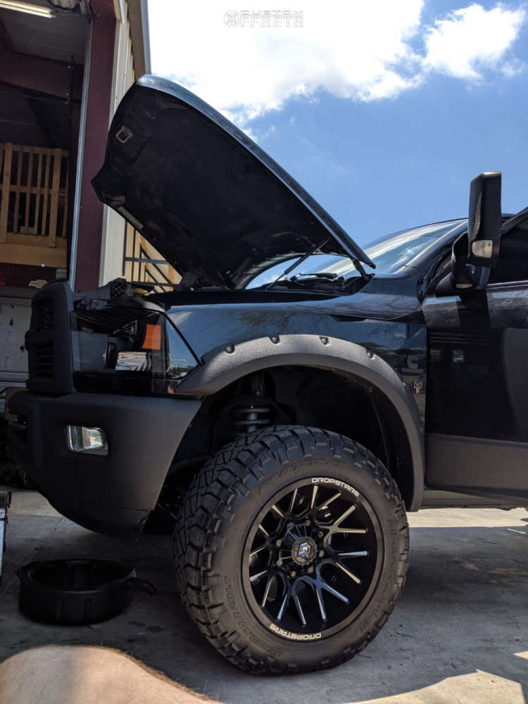 2011 Ram 2500 with 20x10 -25 Dropstars 654bm and 35/12.5R20 Nitto Ridge ...