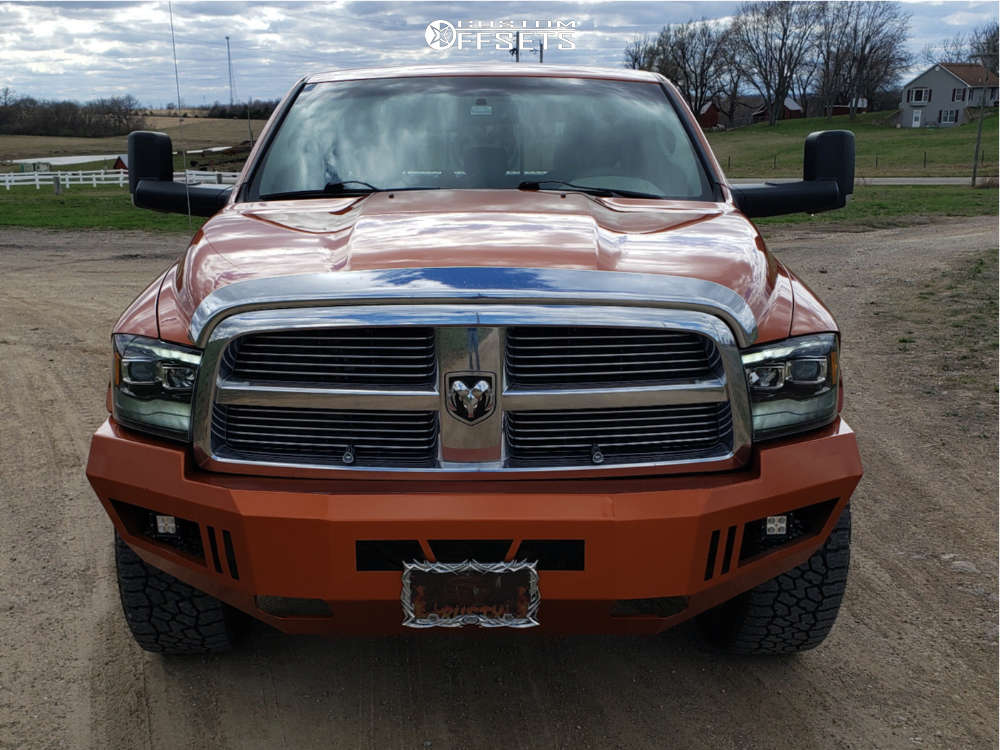 2010 Dodge Ram 1500 with 20x10 -25 Vision Bomb and 305/55R20 Falken ...