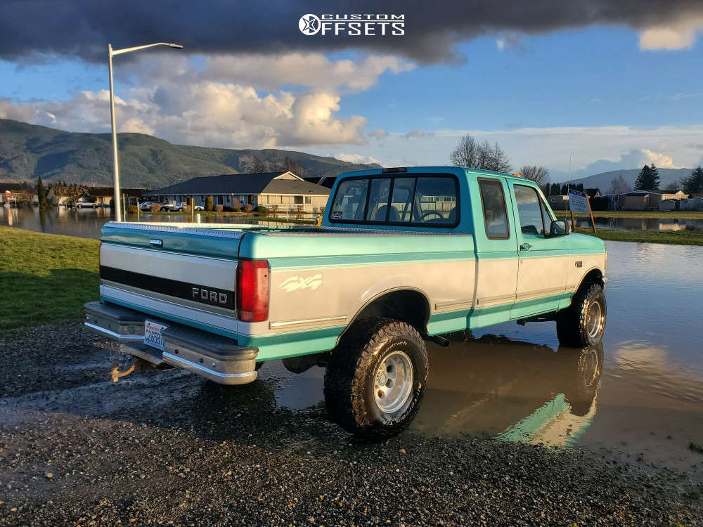 1995 Ford F-150 with 15x10 -47 Pro Comp Series 69 and 33/12.5R15 ...