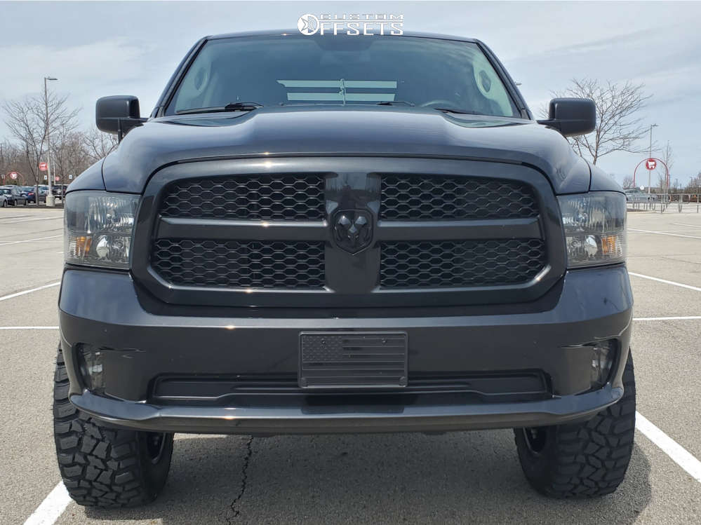 2016 Ram 1500 with 20x10 -25 Motiv Offroad Magnus and 35/12.5R20 Cooper ...
