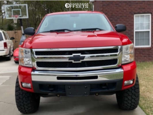 2011 Chevrolet Silverado 1500 with 18x12 -44 Moto Metal Mo962 and 35/12 ...