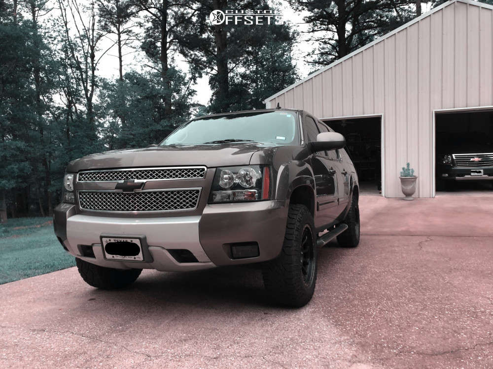 2012 Chevrolet Suburban 1500 with 18x9 0 Pro Comp Series 34 and 275 ...