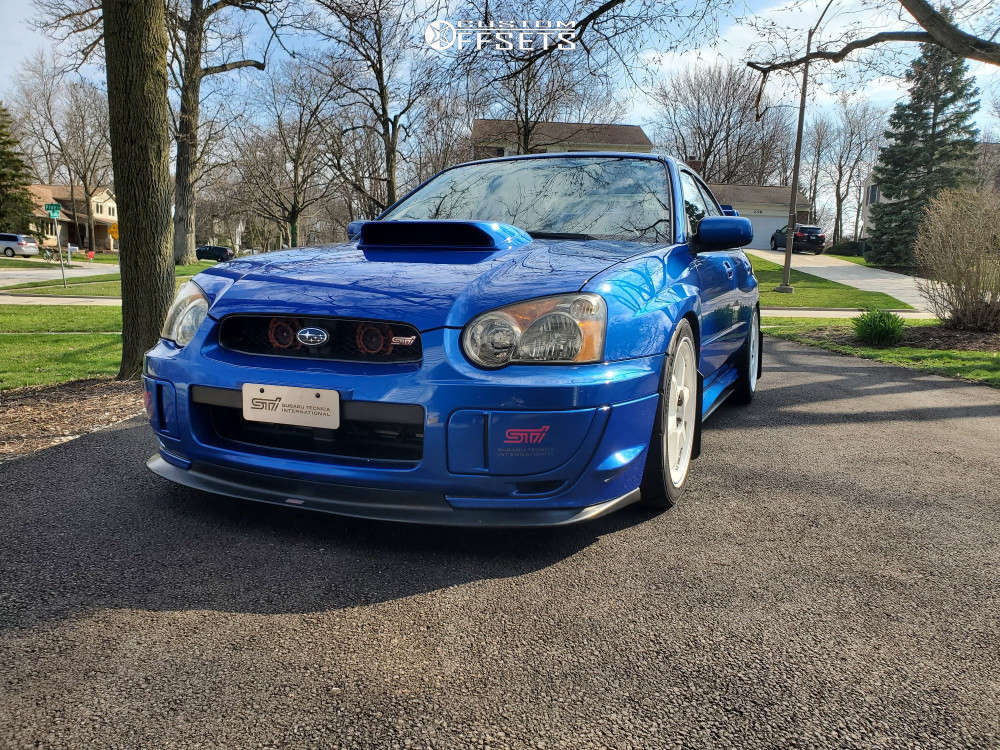 2004 Subaru WRX STI with 18x8.5 40 Buddy Club P1 and 235/40R18 Hankook ...