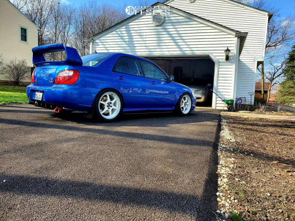 2004 Subaru WRX STI with 18x8.5 40 Buddy Club P1 and 235/40R18 Hankook ...