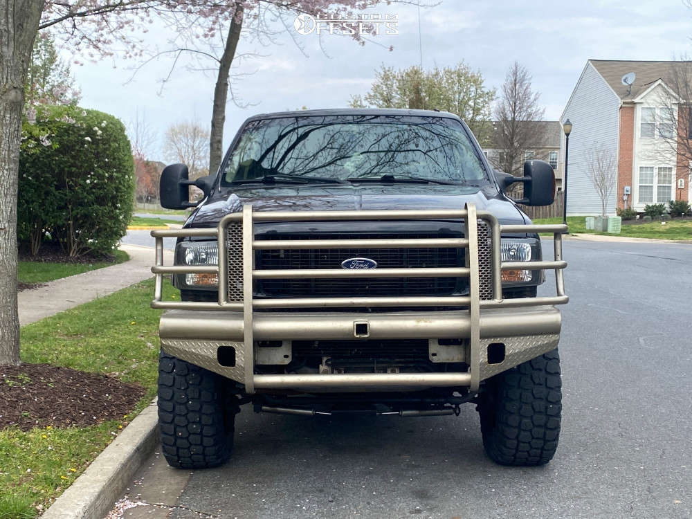 2004 Ford Excursion with 20x10 -24 XD Grenade and 37/13.5R20 Ironman ...