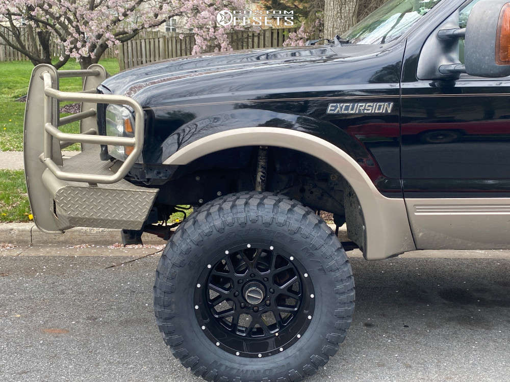 2004 Ford Excursion with 20x10 -24 XD Grenade and 37/13.5R20 Ironman ...
